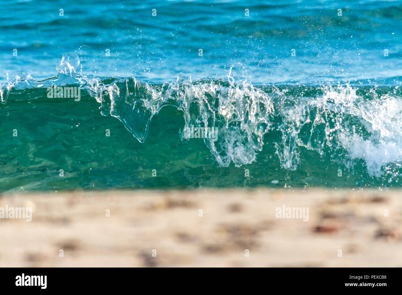 Crystal clear waves hi-res stock photography and images - Alamy