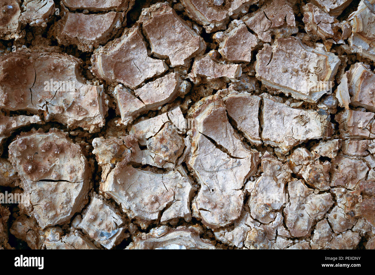 Cracked dry land without water-color effect Stock Photo - Alamy