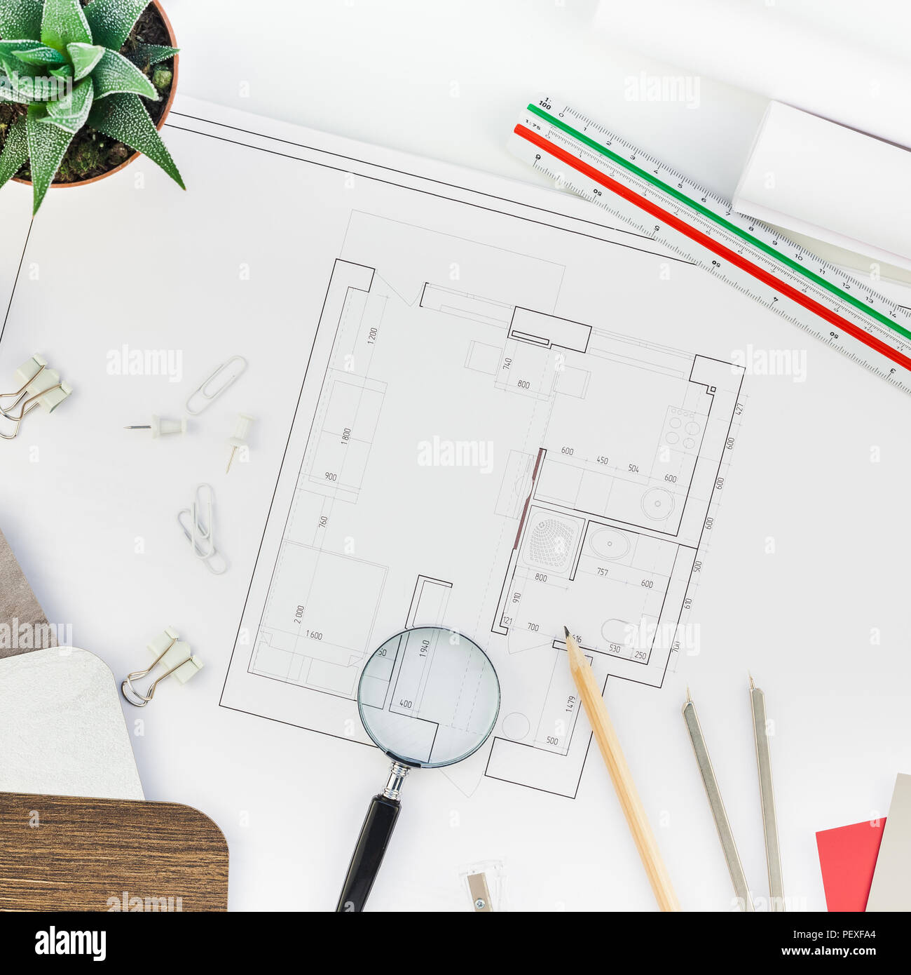 Creative flat lay overhead top view blueprints architectural flat ...