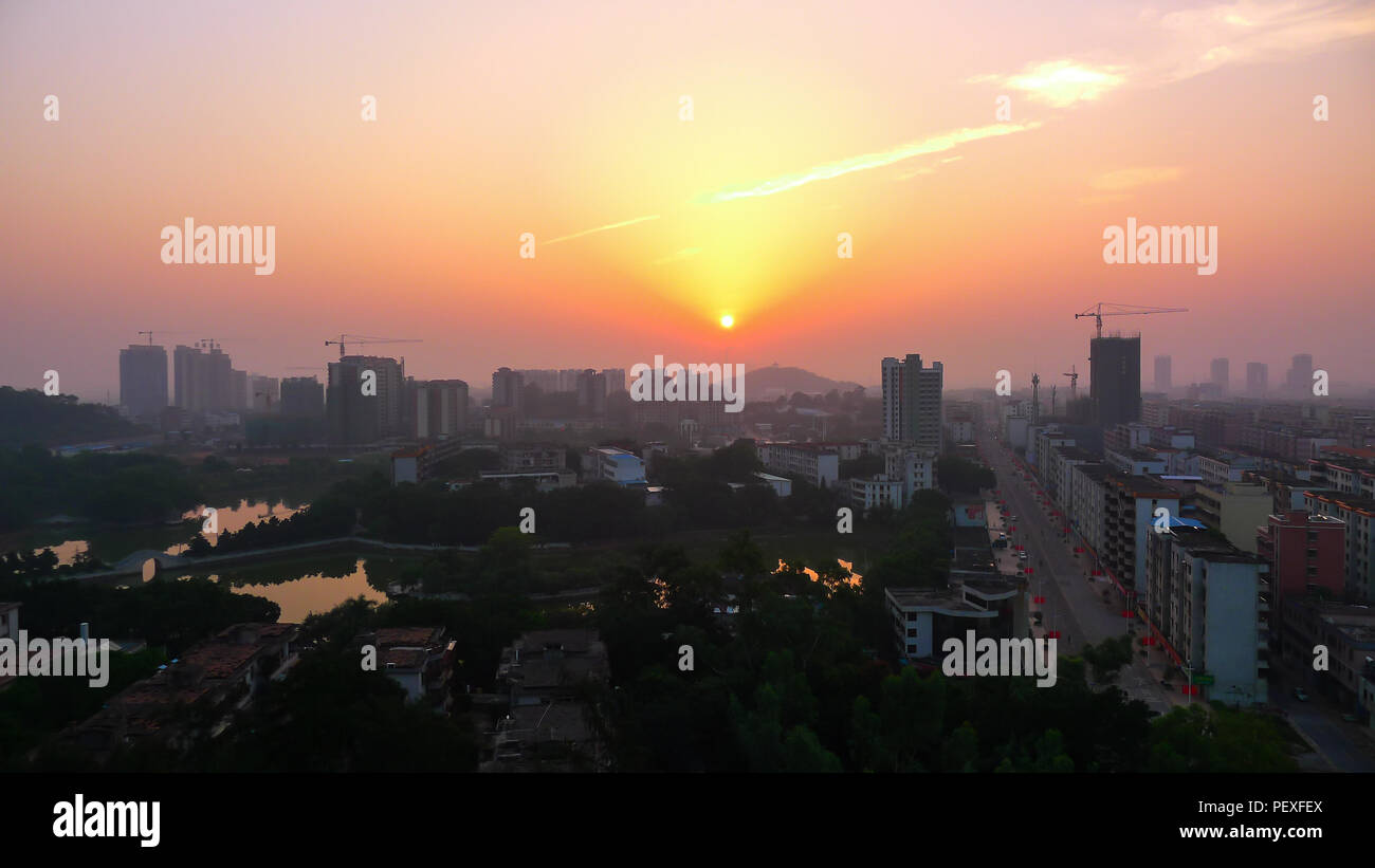 Chinese Modern City Buildings in the Sunset Stock Photo - Alamy