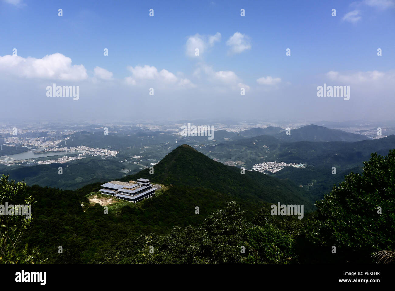 Mountains and Distant Buildings From a High Level Stock Photo - Alamy