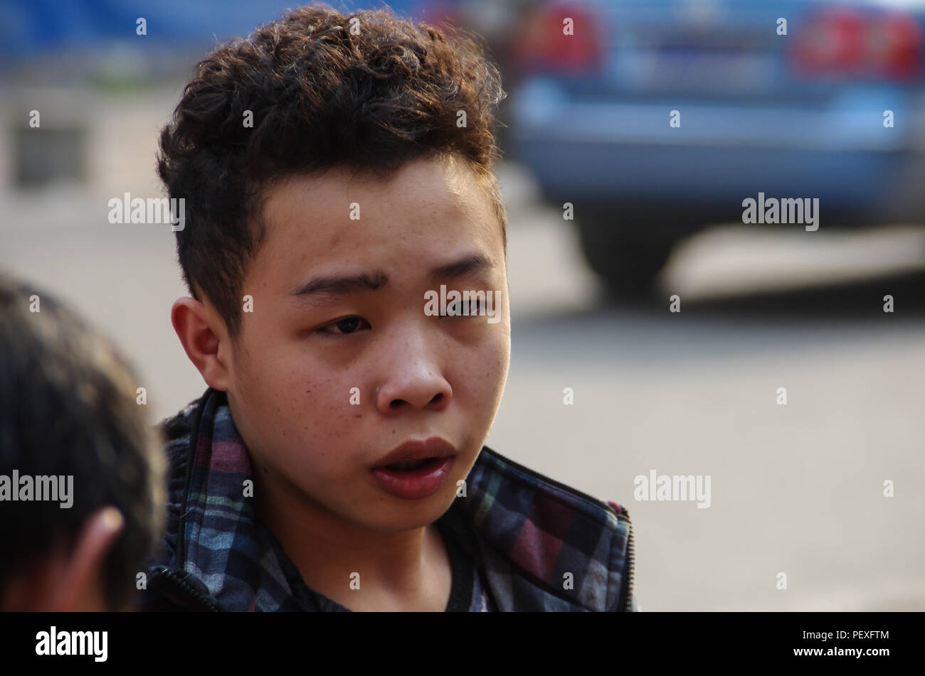 A Close-up of a Chinese Young Man Stock Photo - Alamy