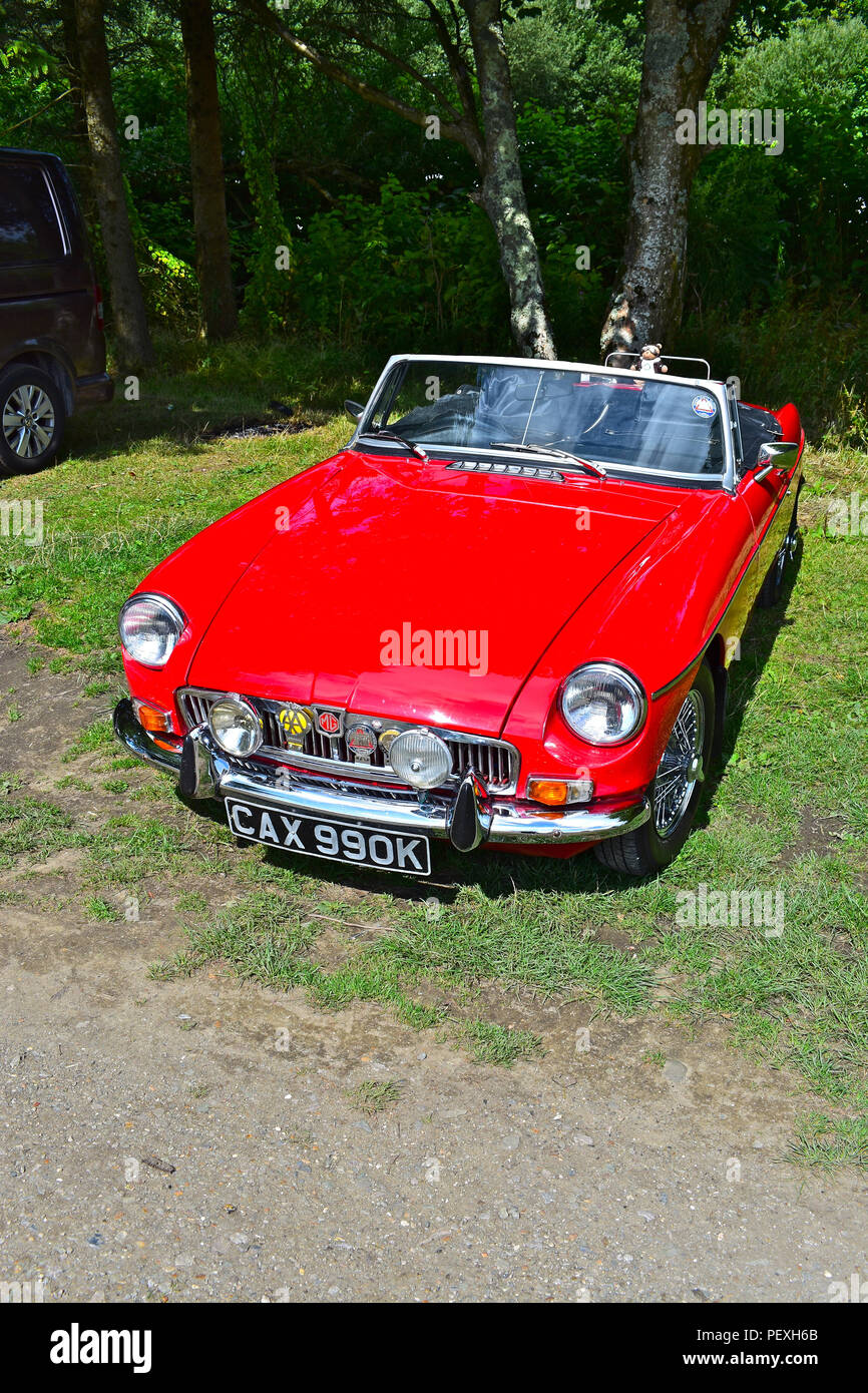 Classic bright red MGB open-topped sports car spotted in car park at ...