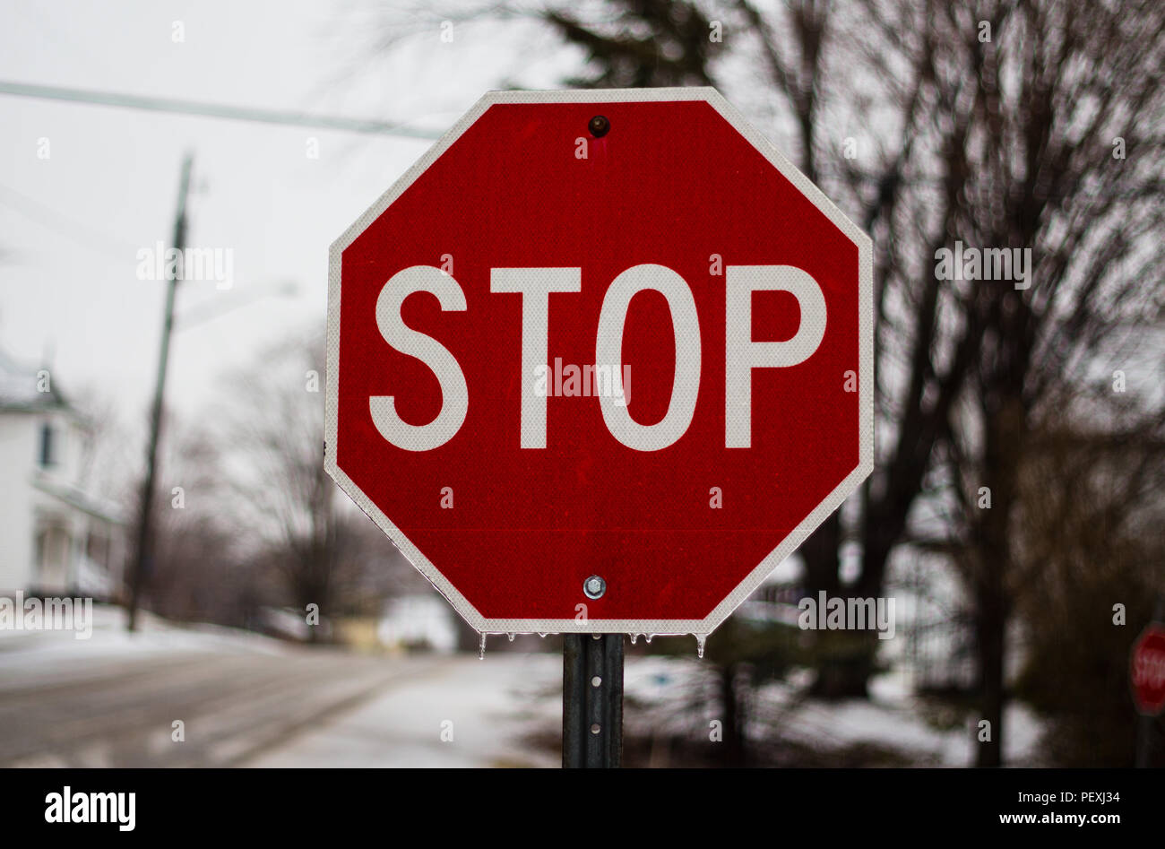 Stop street sign in winter break hazard drive carefully in the weather ...