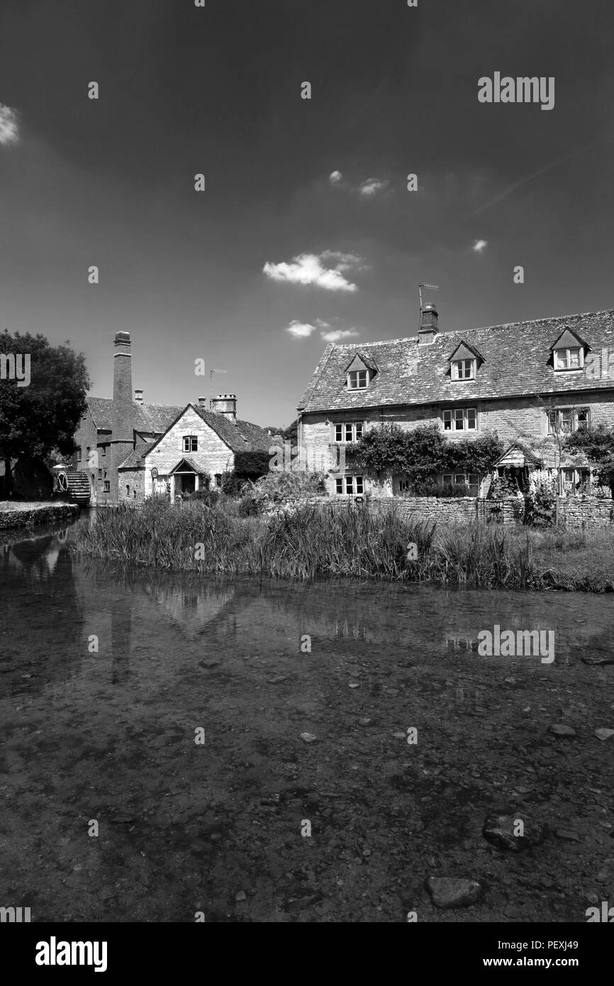 Summer view over Cottages and the River Eye, Lower Slaughter village ...
