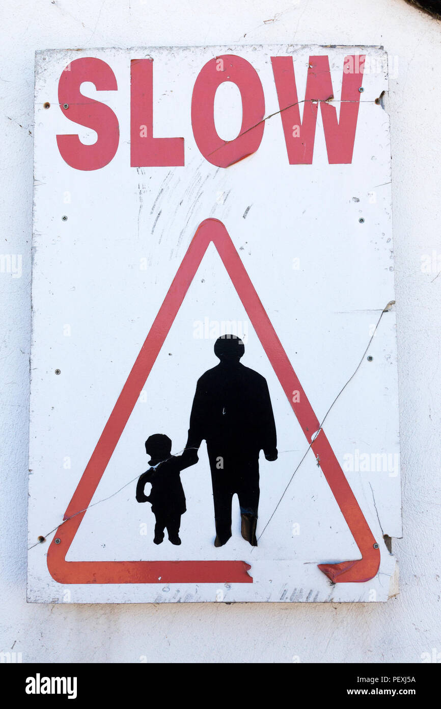 Slow warning sign in Battlesbridge, village in Essex, UK Stock Photo ...