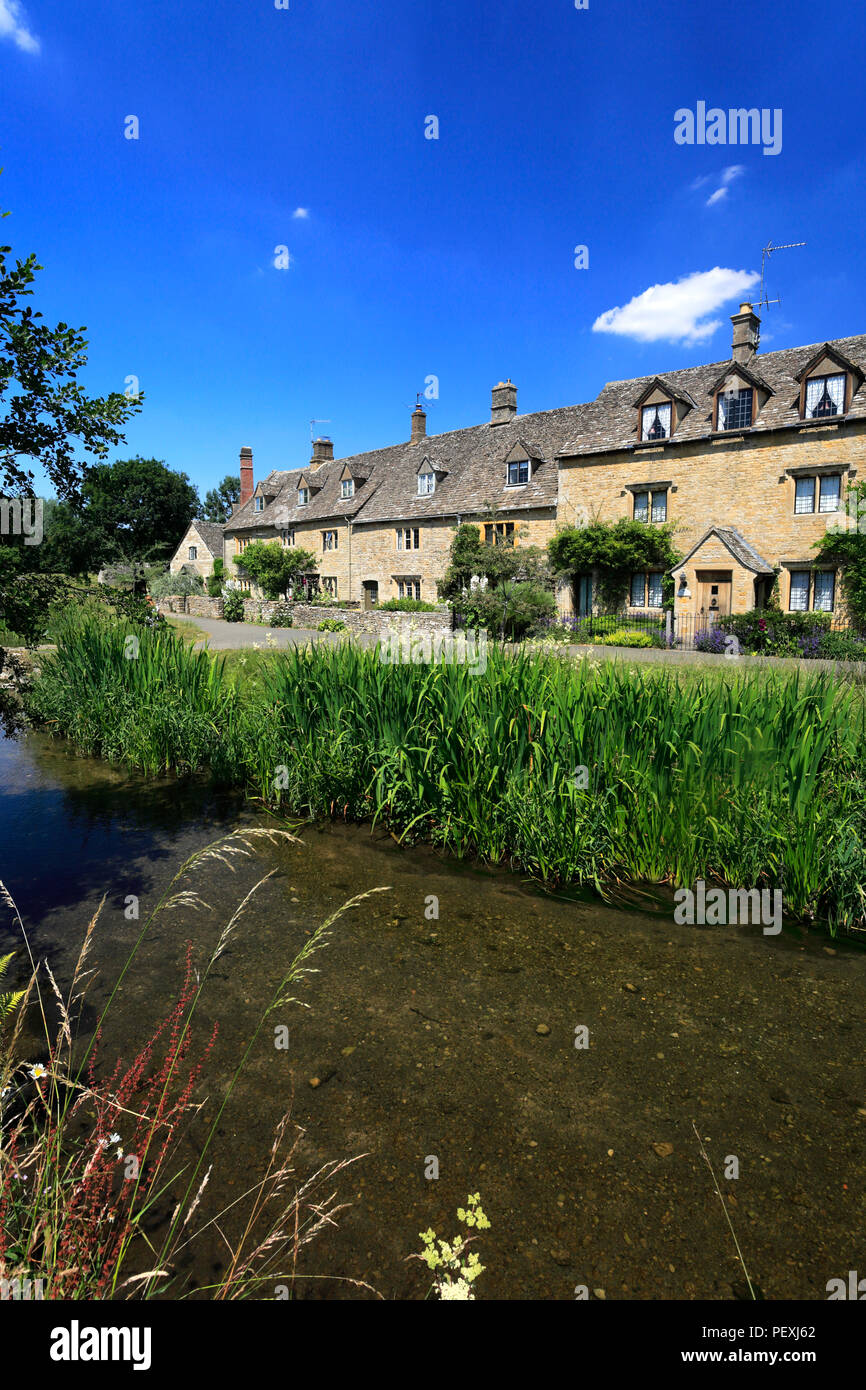 Summer view over Cottages and the River Eye, Lower Slaughter village ...