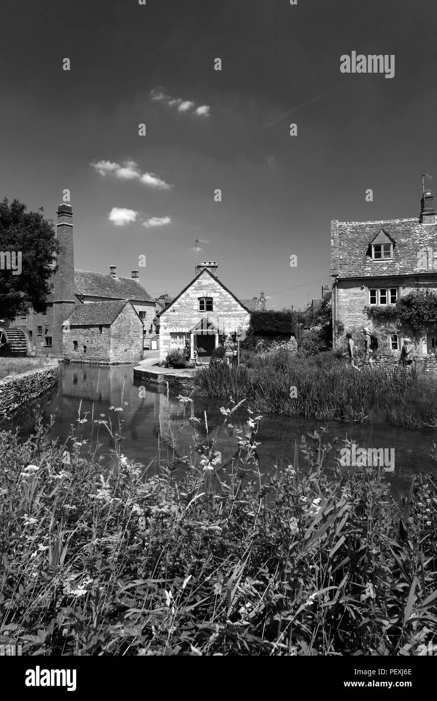 Summer view over Cottages and the River Eye, Lower Slaughter village ...