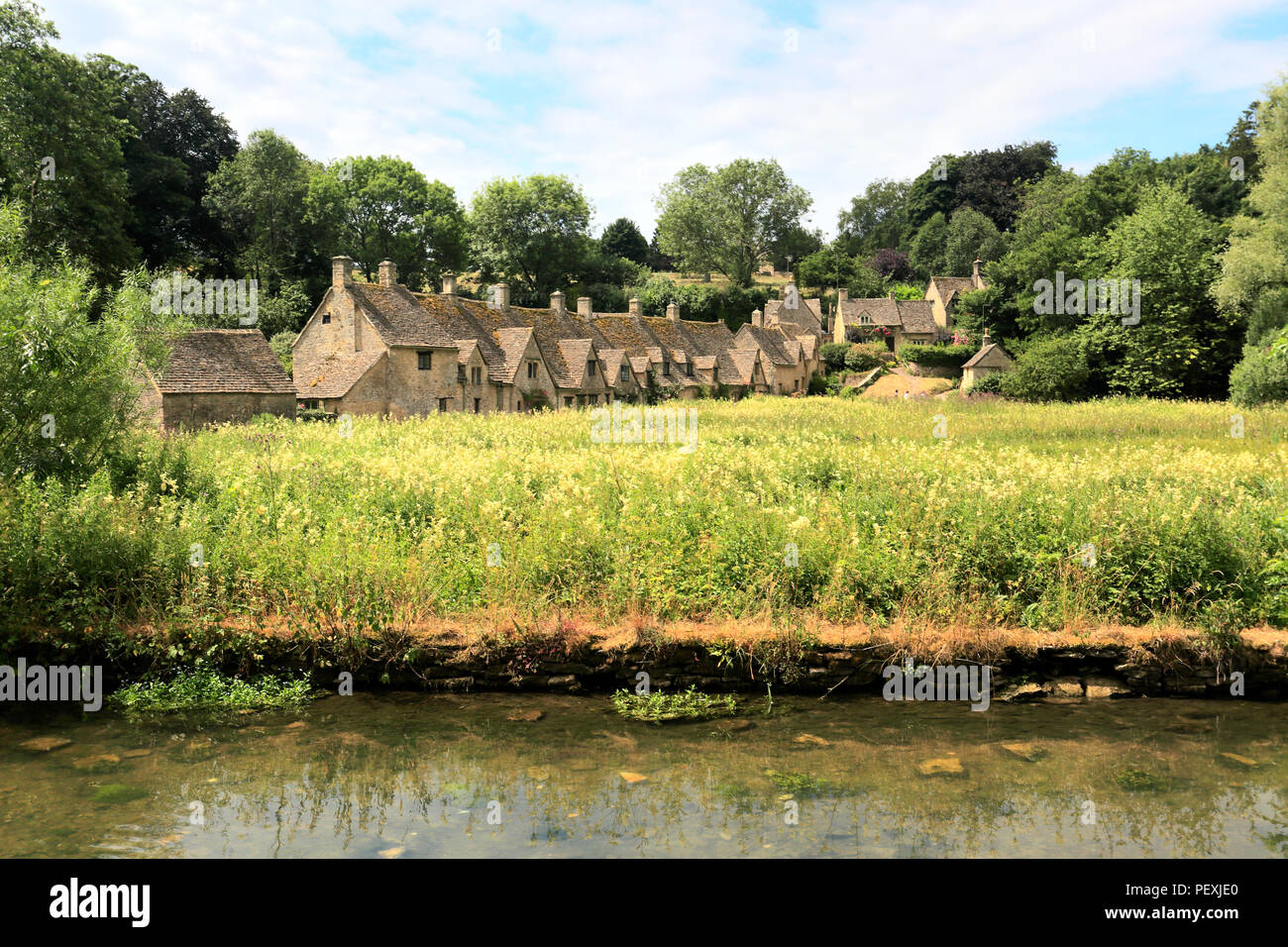 The Arlington Row Stone Cottages, River Coln, Bibury village ...