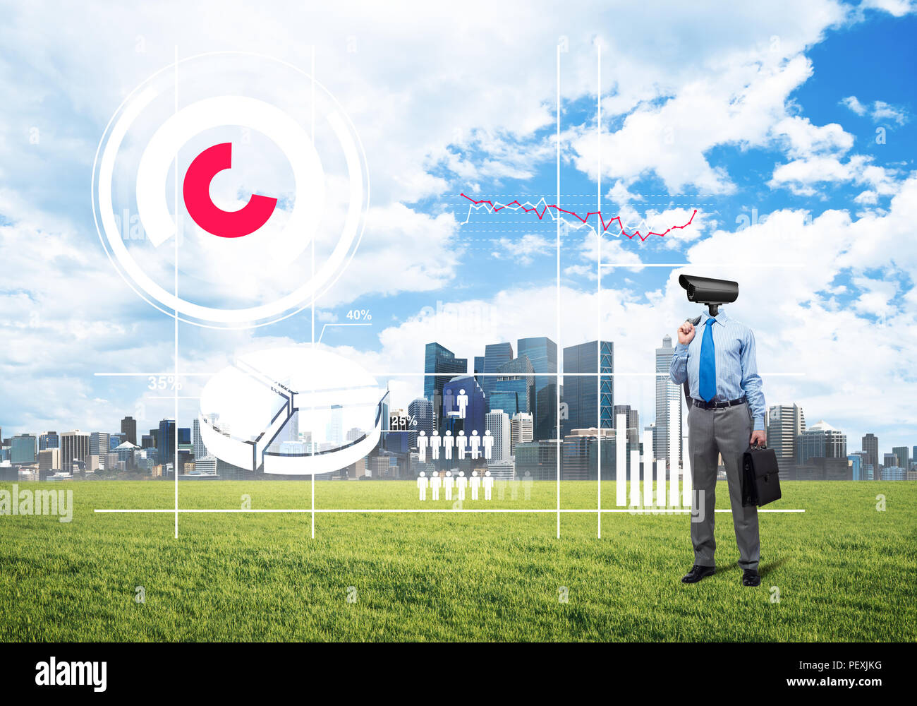 Camera headed man standing on green grass against modern cityscape ...