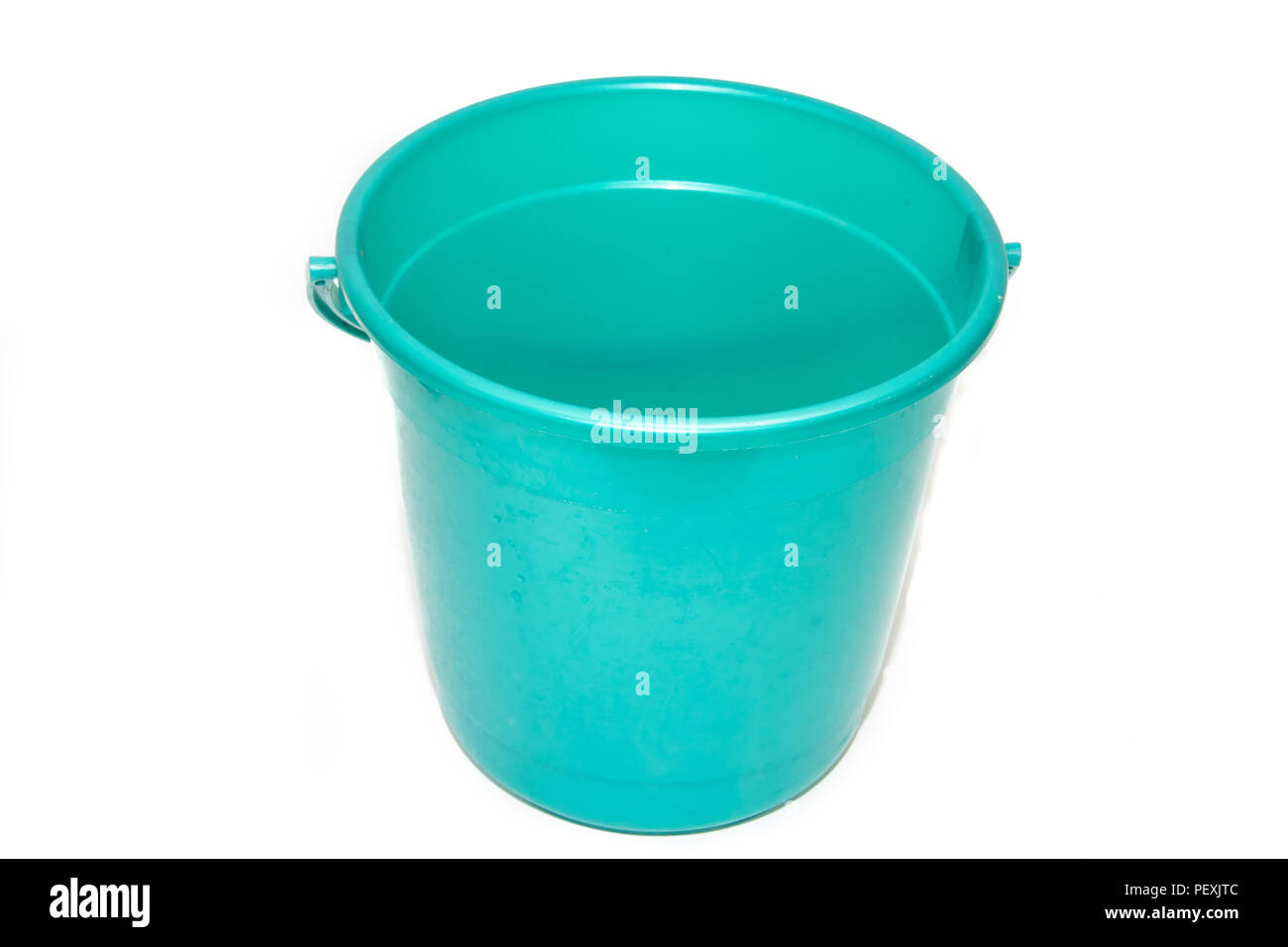 A bucket on a white background. Plastic green bucket on a white ...