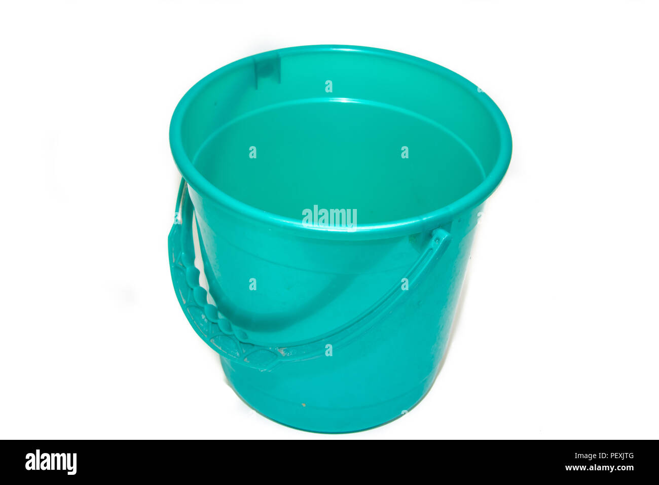 A bucket on a white background. Plastic green bucket on a white ...