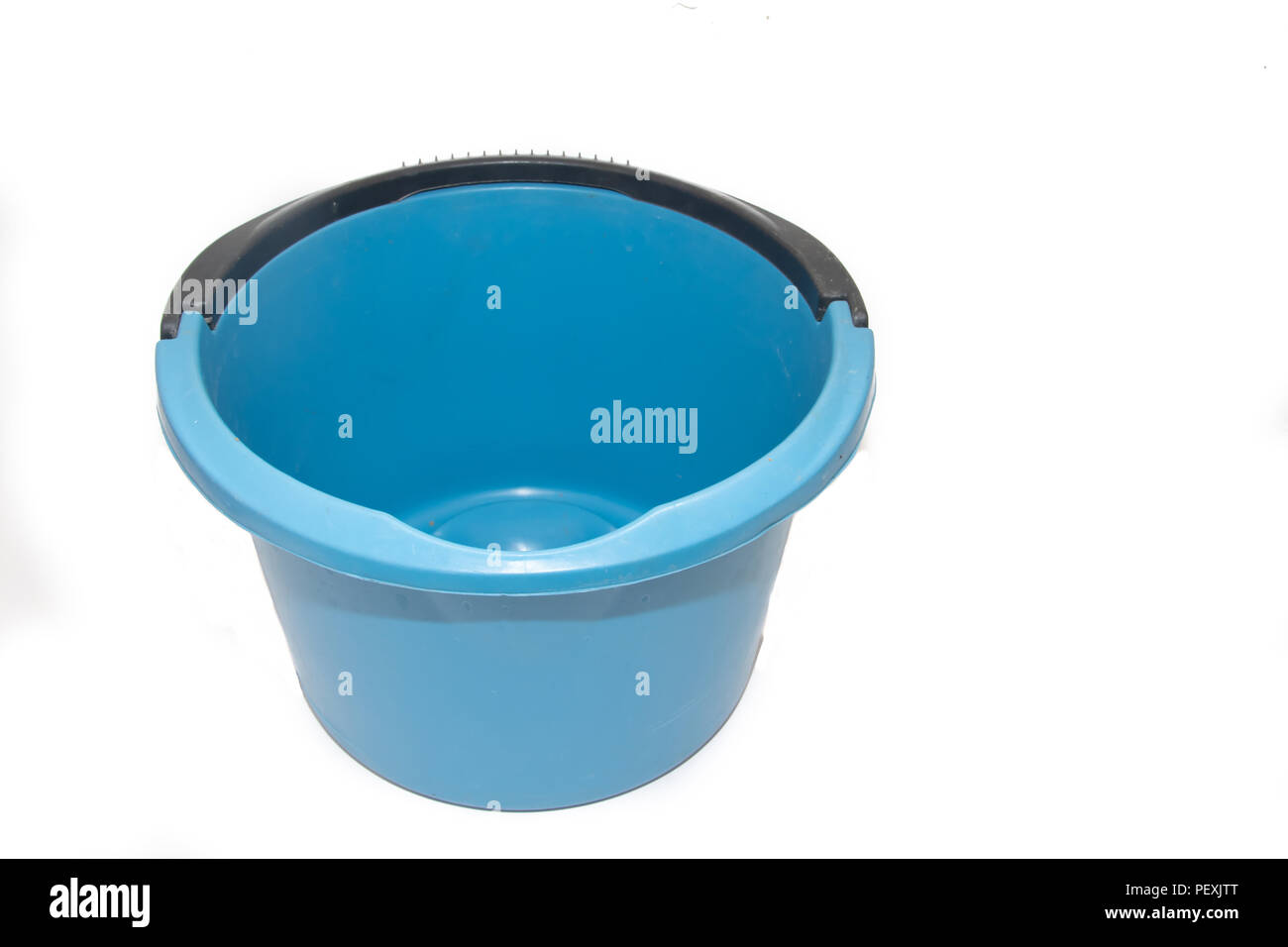 A bucket on a white background. Plastic blue bucket on a white ...