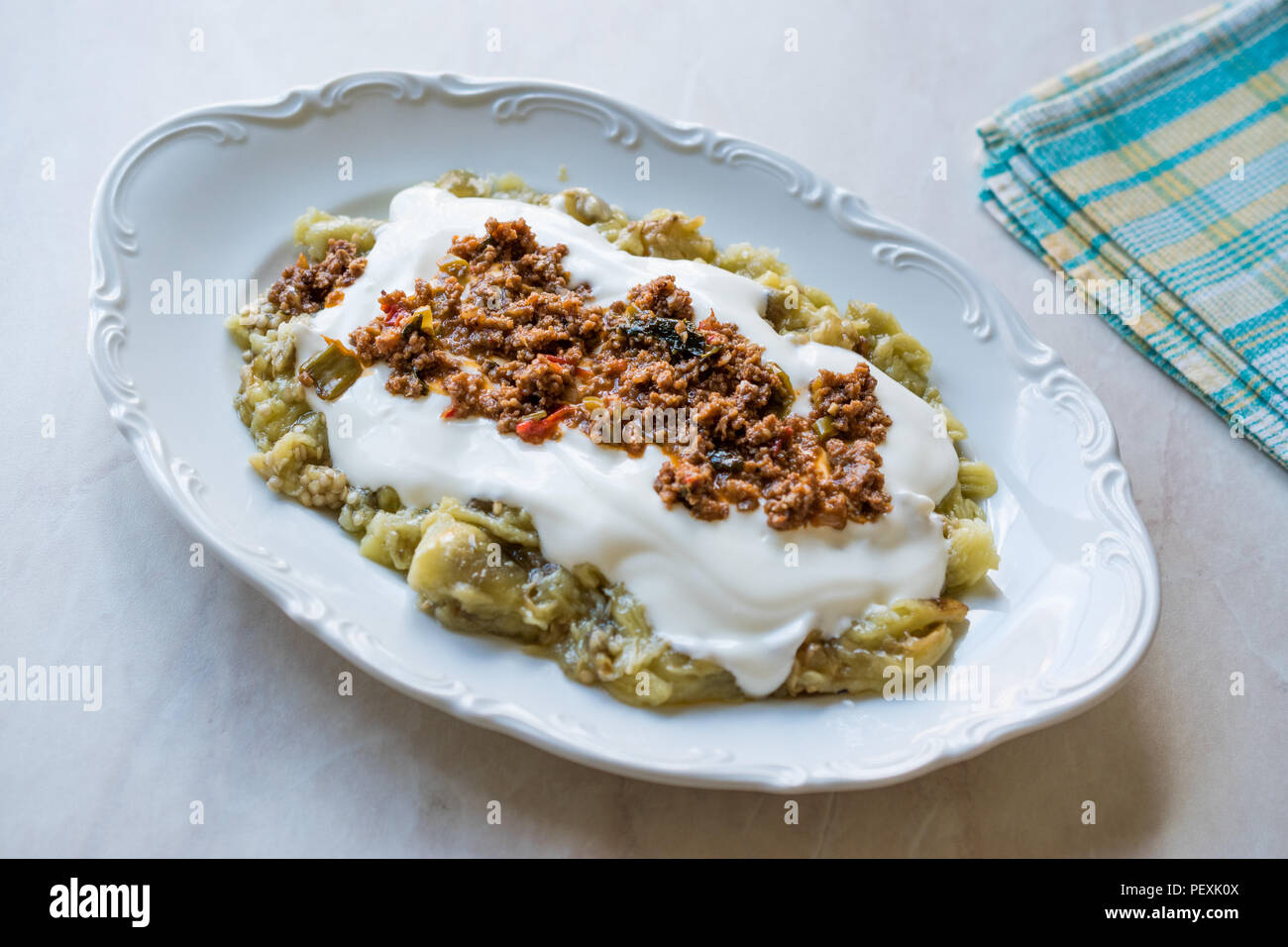 Turkish Ali Nazik Kebab with Yogurt, Minced Meat and Roasted Eggplant ...