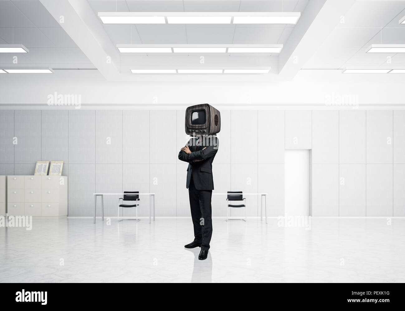 Businessman with an old TV instead of head Stock Photo - Alamy