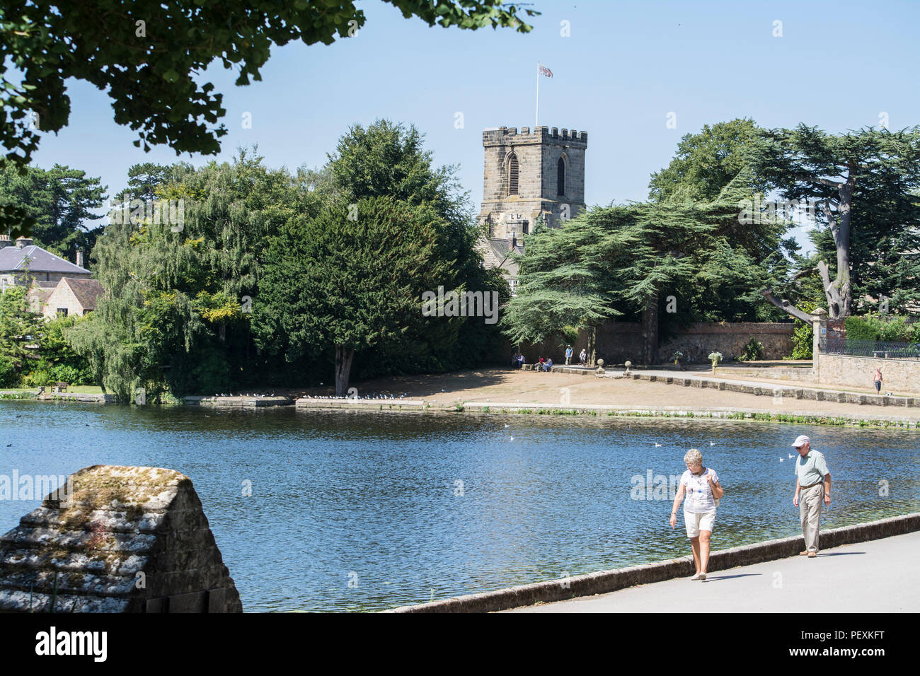 The pool and Melbourne Parish Church, Derbyshire, UK Stock Photo - Alamy