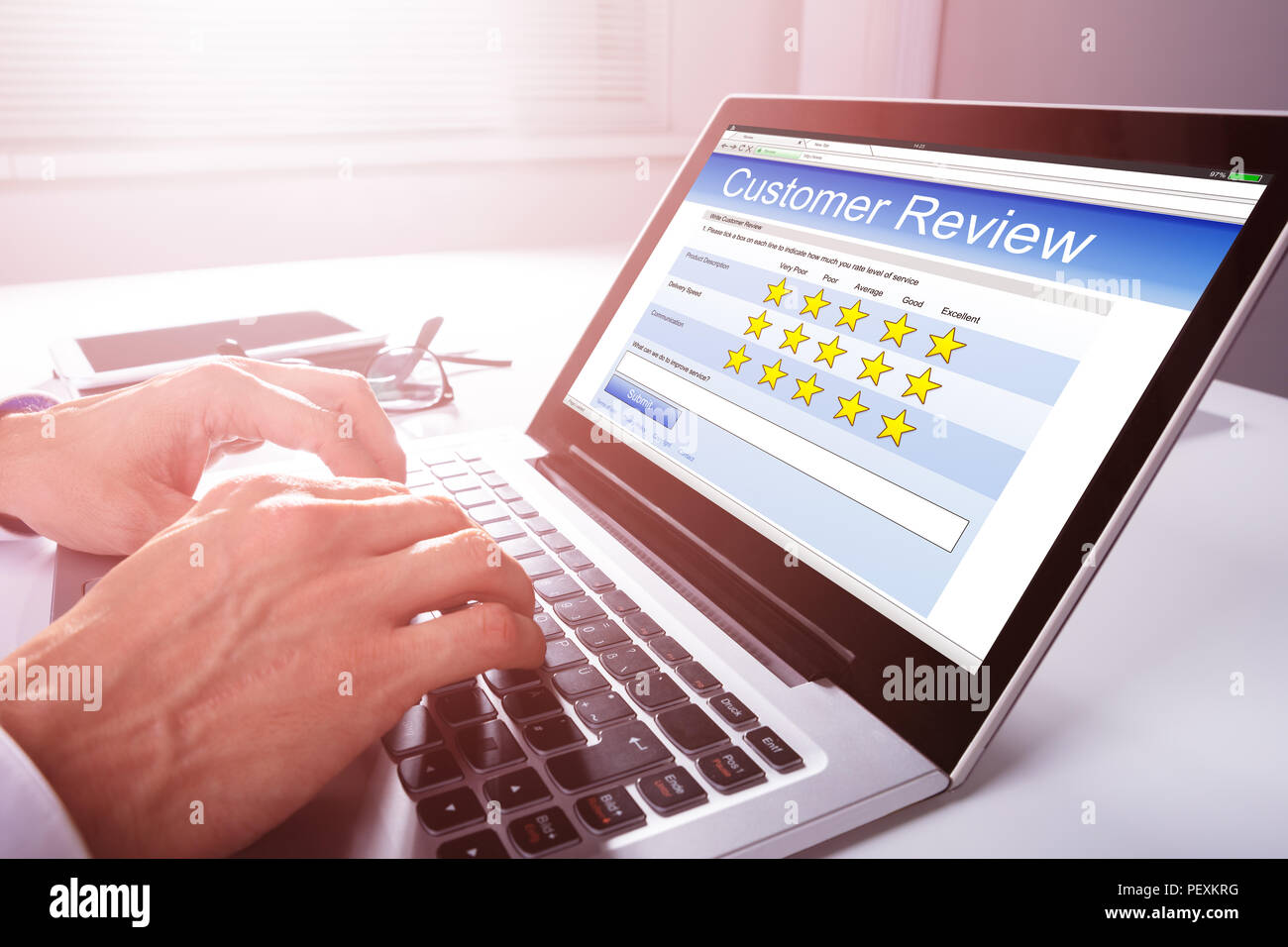 Businessman's Hand Reviewing His Experience On Laptop Over Desk Stock ...