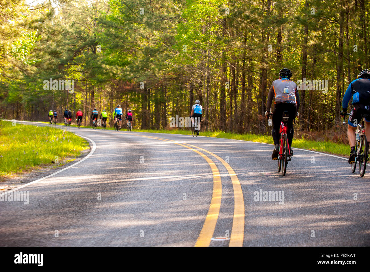 Cyclist riding along urban hi-res stock photography and images - Alamy
