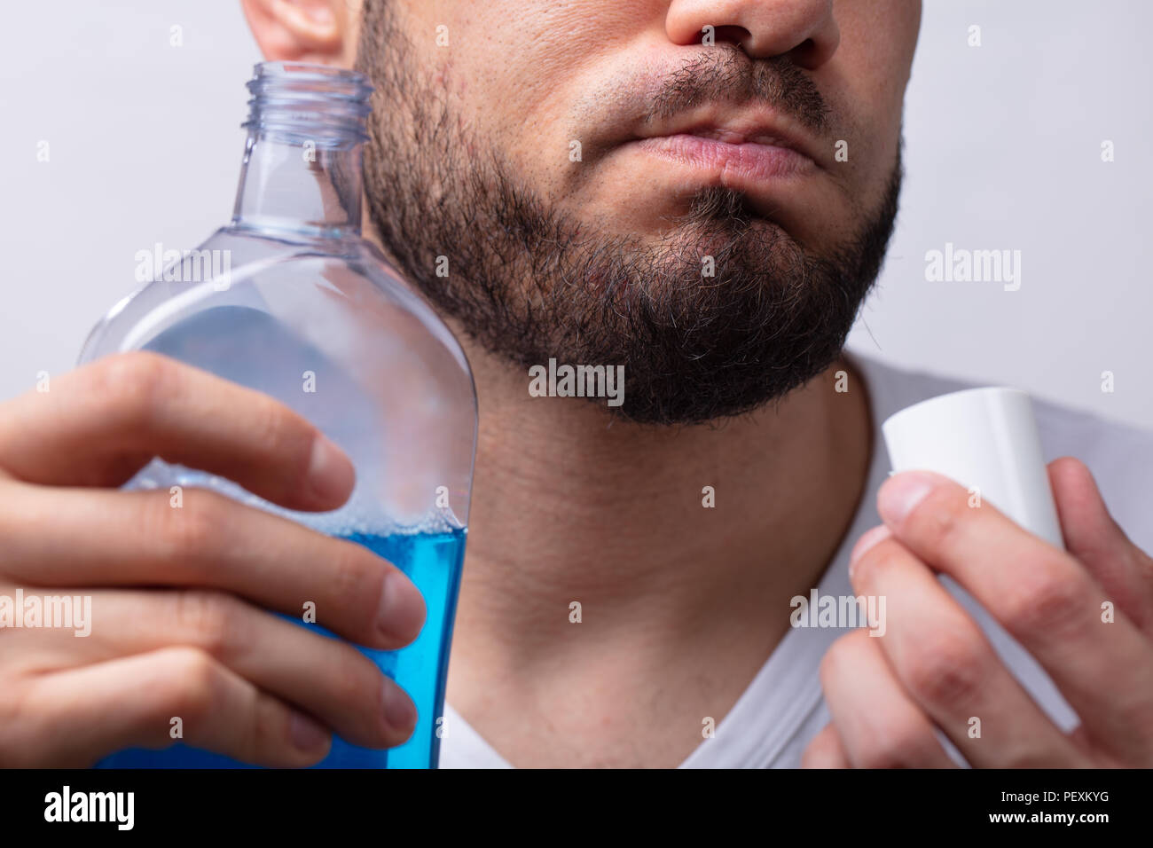 Man rinsing mouth wash hi-res stock photography and images - Alamy