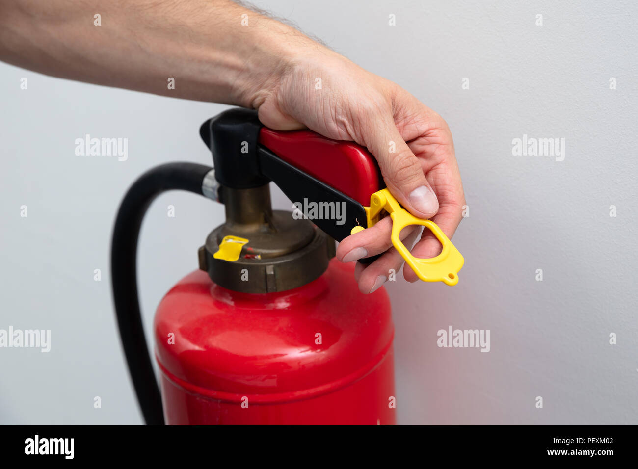 Close-up Of A Male Technician Hand Inspecting Hose Of The Fire ...