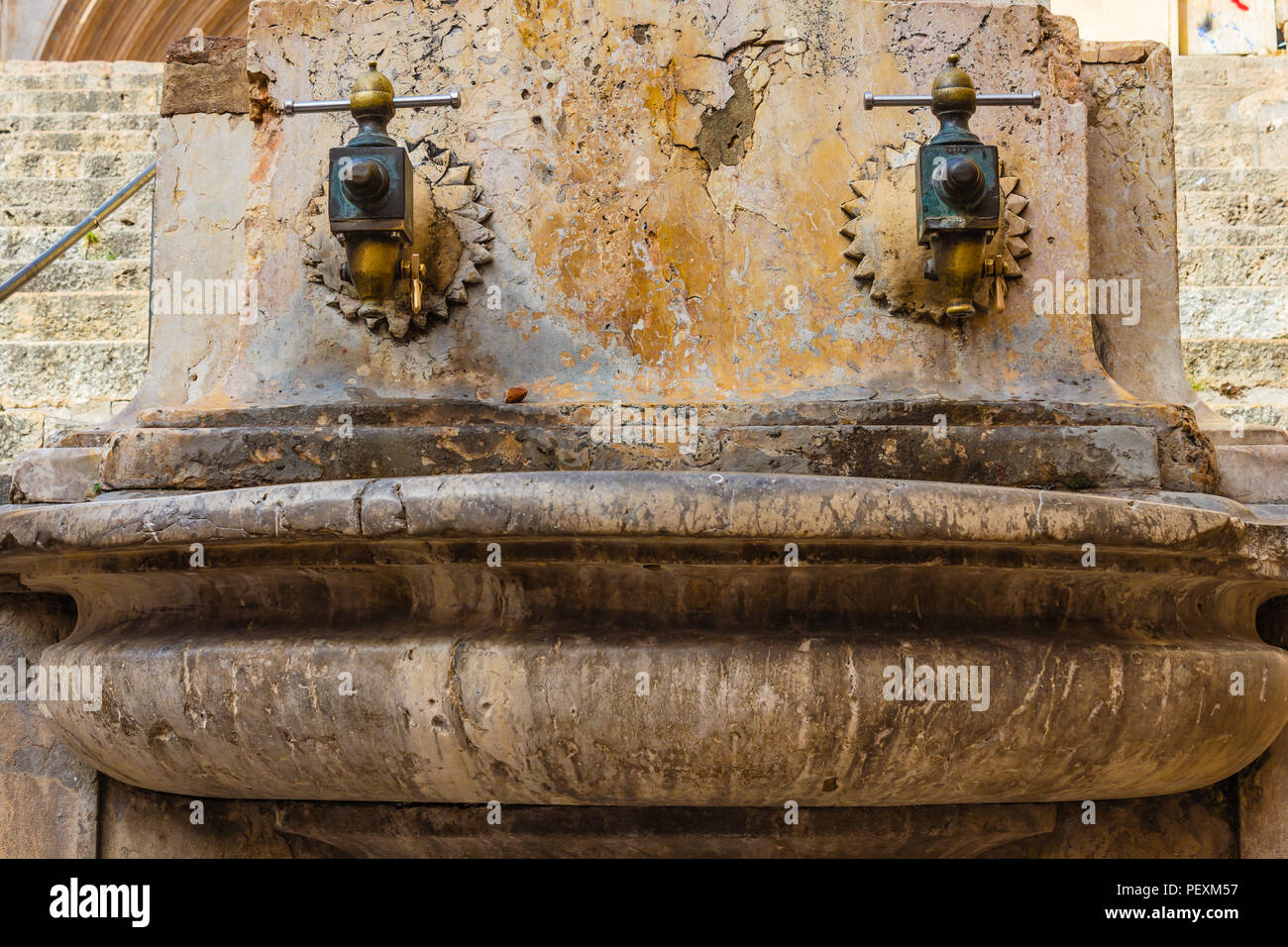 old stone fountain from the 1800 located in the historic center of ...