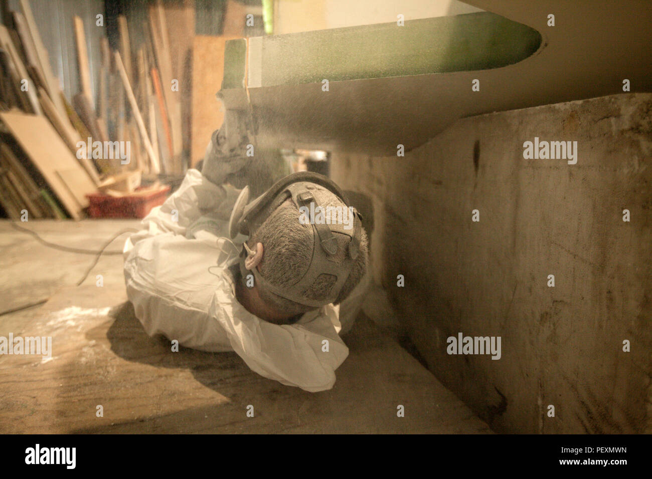 Man using grinder while building ship, Lorient Keroman Submarine Base ...