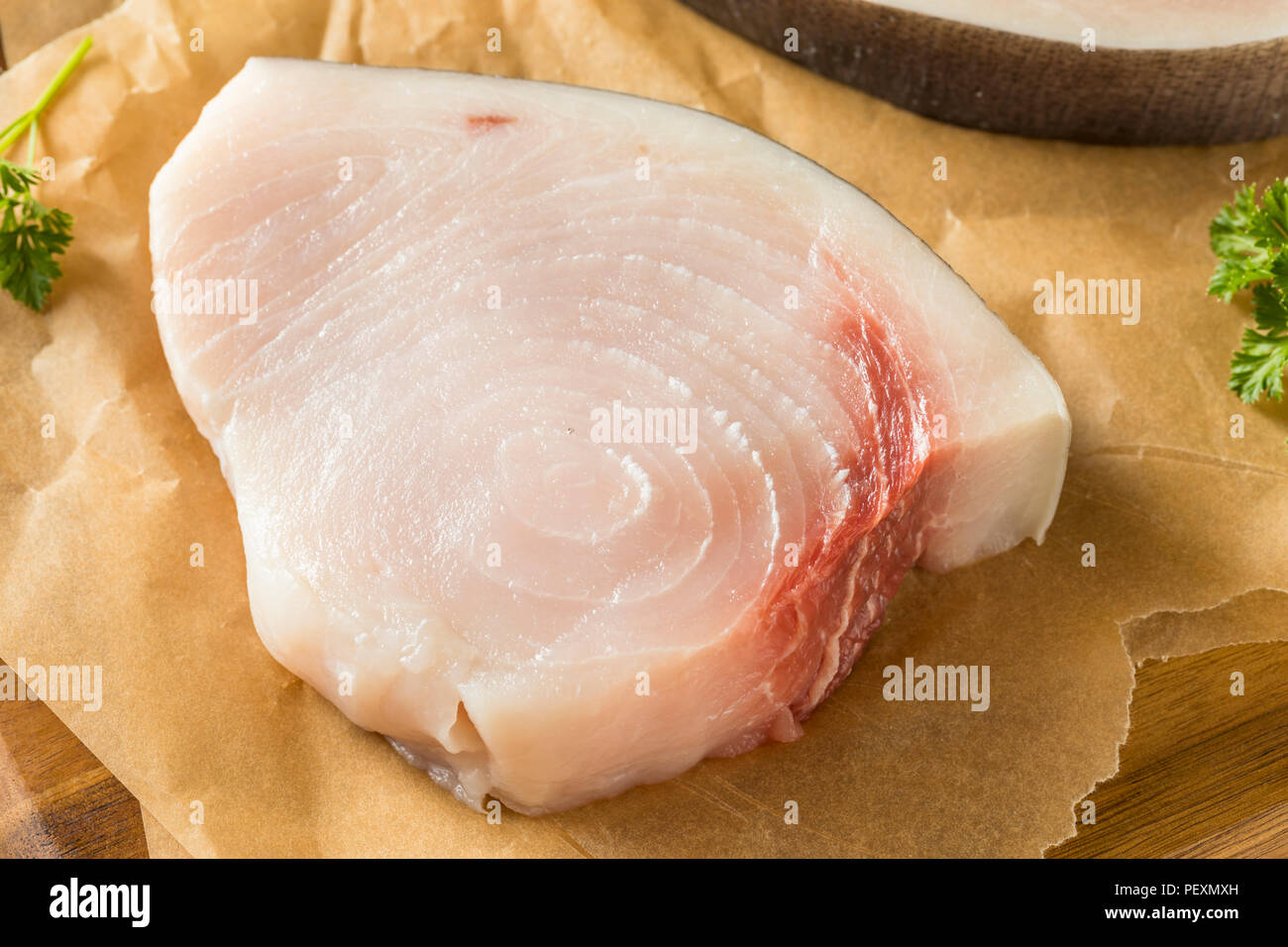 Fresh uncooked raw swordfish fillet hi-res stock photography and images ...