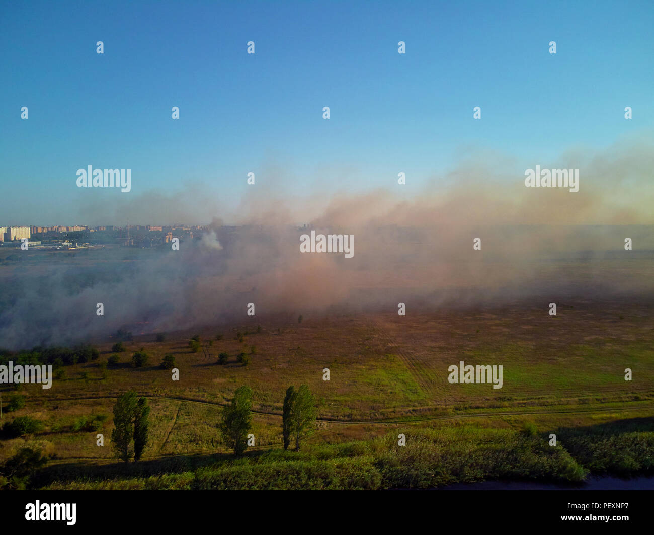 grass burns near the village Stock Photo - Alamy