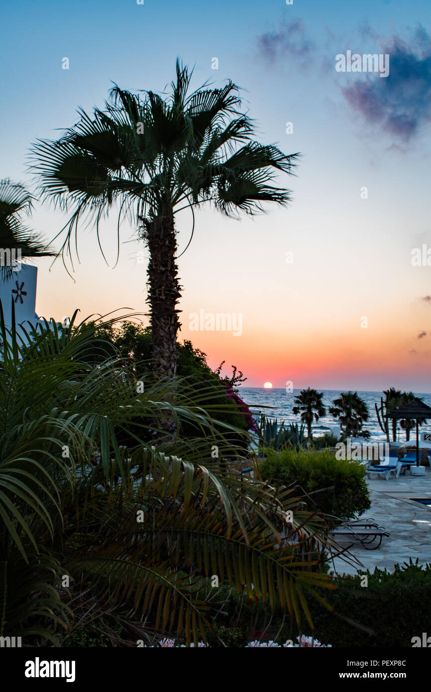 Sunset in holiday resort, Paphos Stock Photo - Alamy