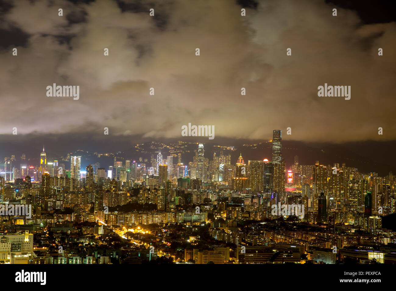 a big asia city by night to the sunrise with all the lights on the ...