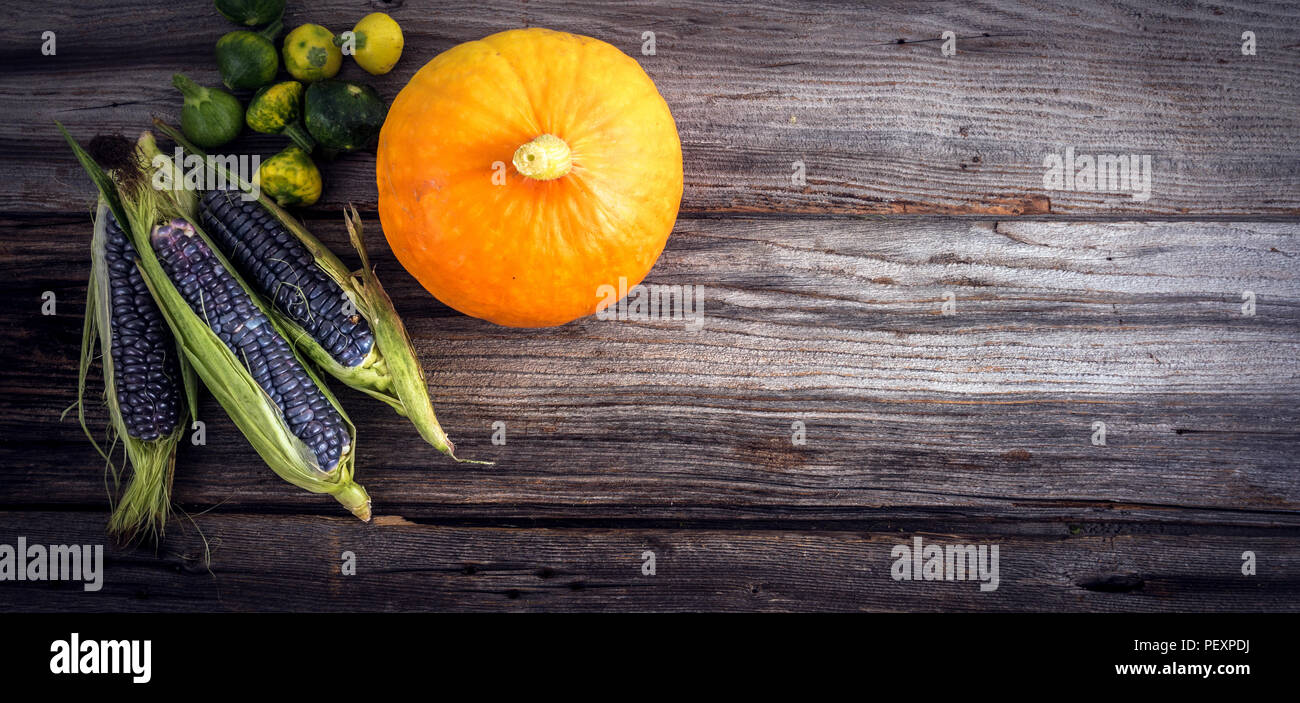 mini blue sweet corn with leaves Stock Photo - Alamy