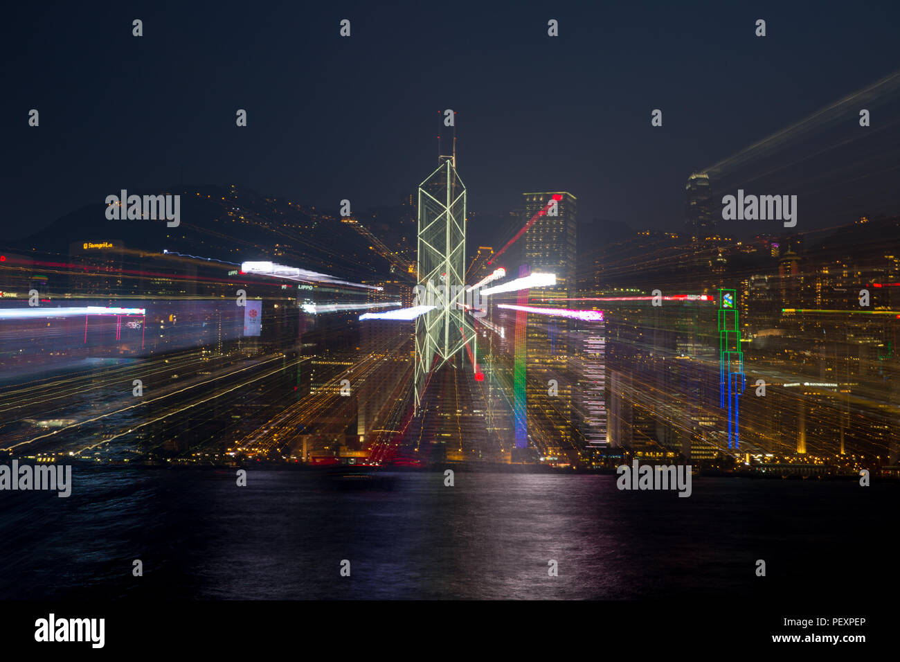 a big asia city by night to the sunrise with all the lights on the ...