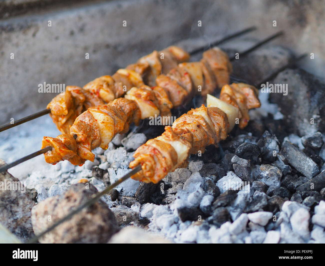 Skewer cooked hi-res stock photography and images - Alamy