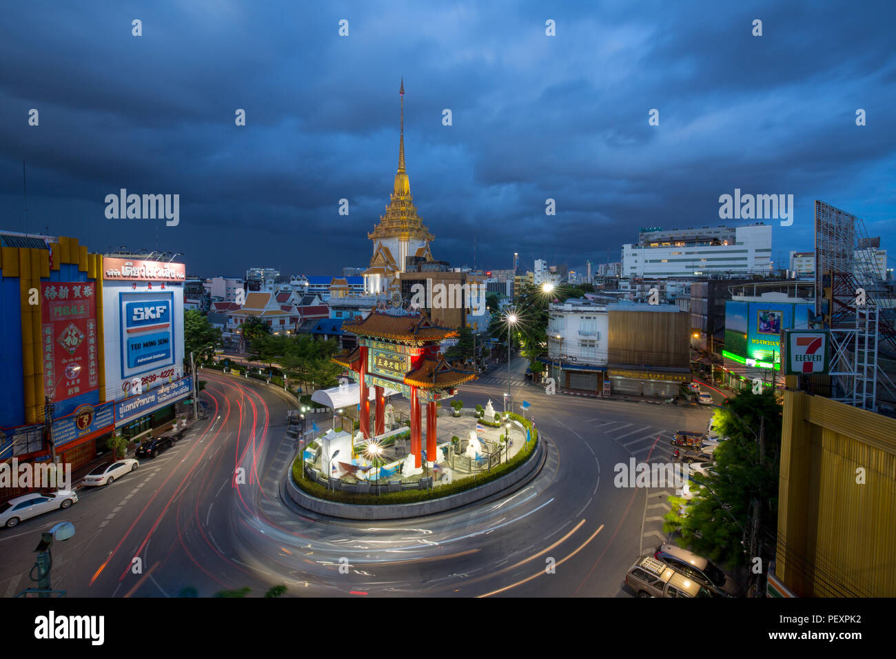 a big asia city by night to the sunrise with all the lights on the ...
