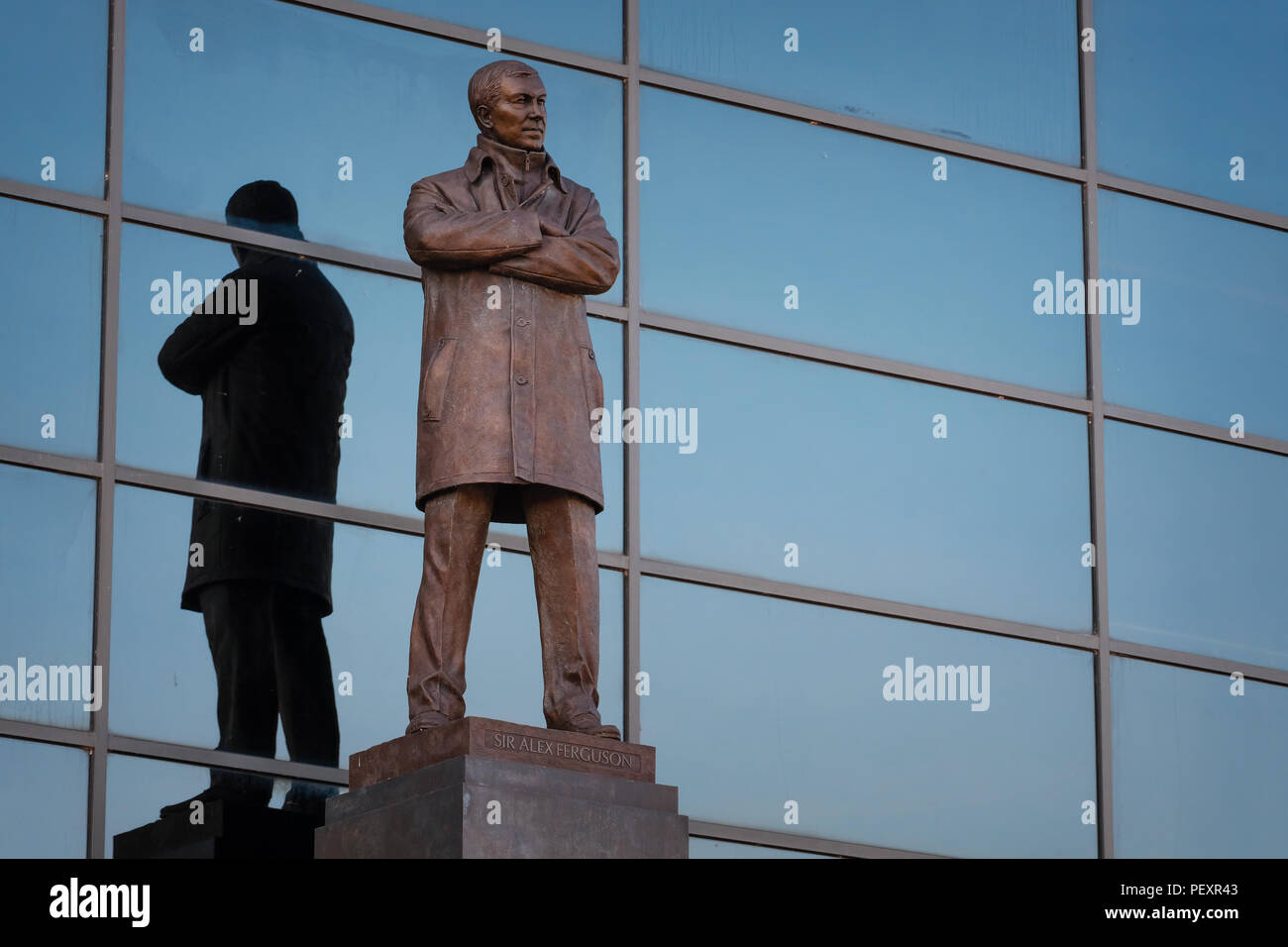 MANCHESTER, UK - MAY 19 2018: Sir Alex Ferguson Bronze statue in front ...
