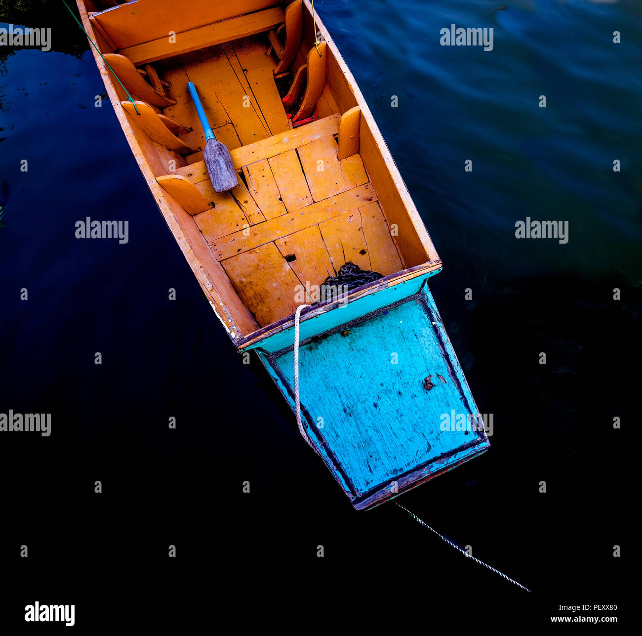 Single Bright Colored Boat from Above Stock Photo - Alamy
