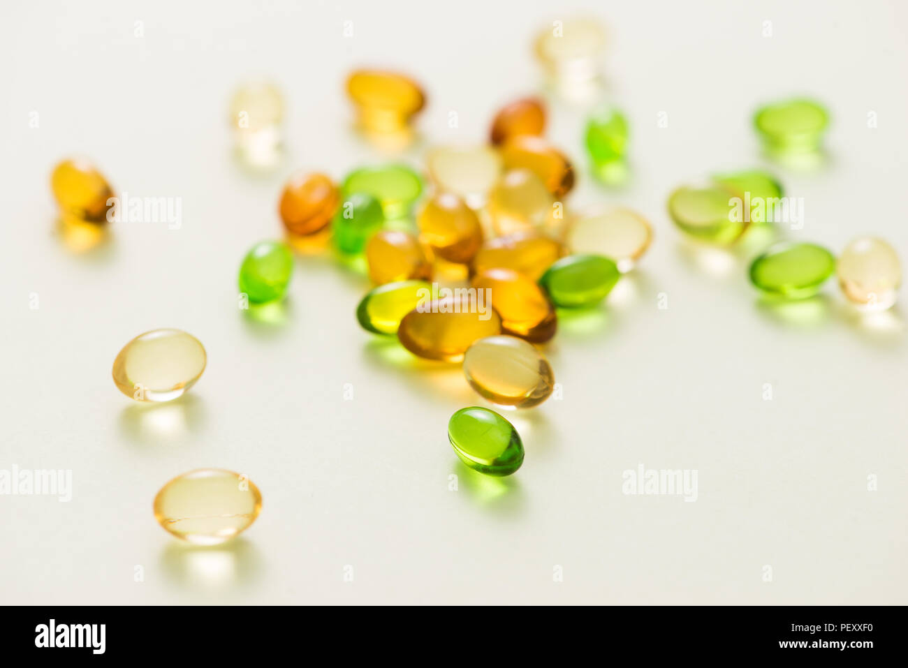 Nutrition And Vitamin Filling In Colorful Soft Gelatin Capsule Stock ...