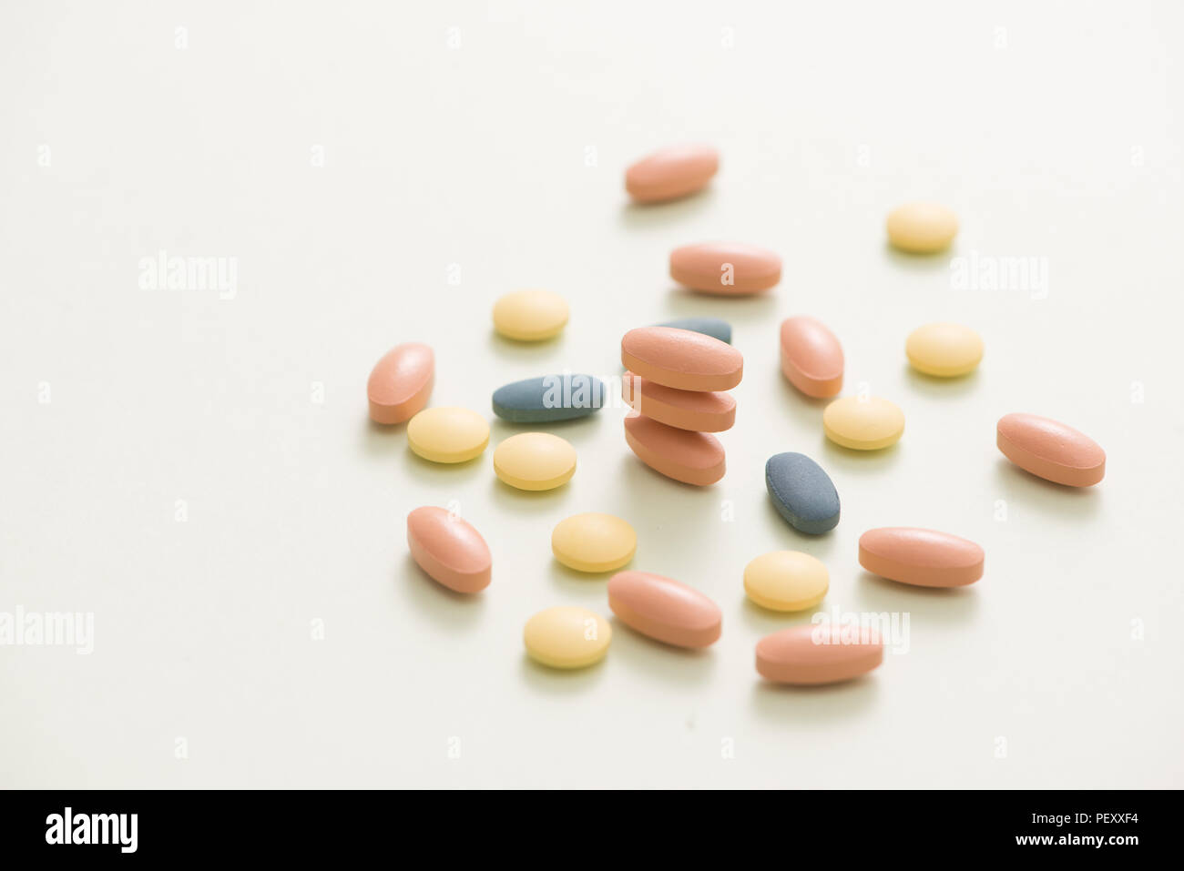 Colorful tablets with capsules Stock Photo - Alamy