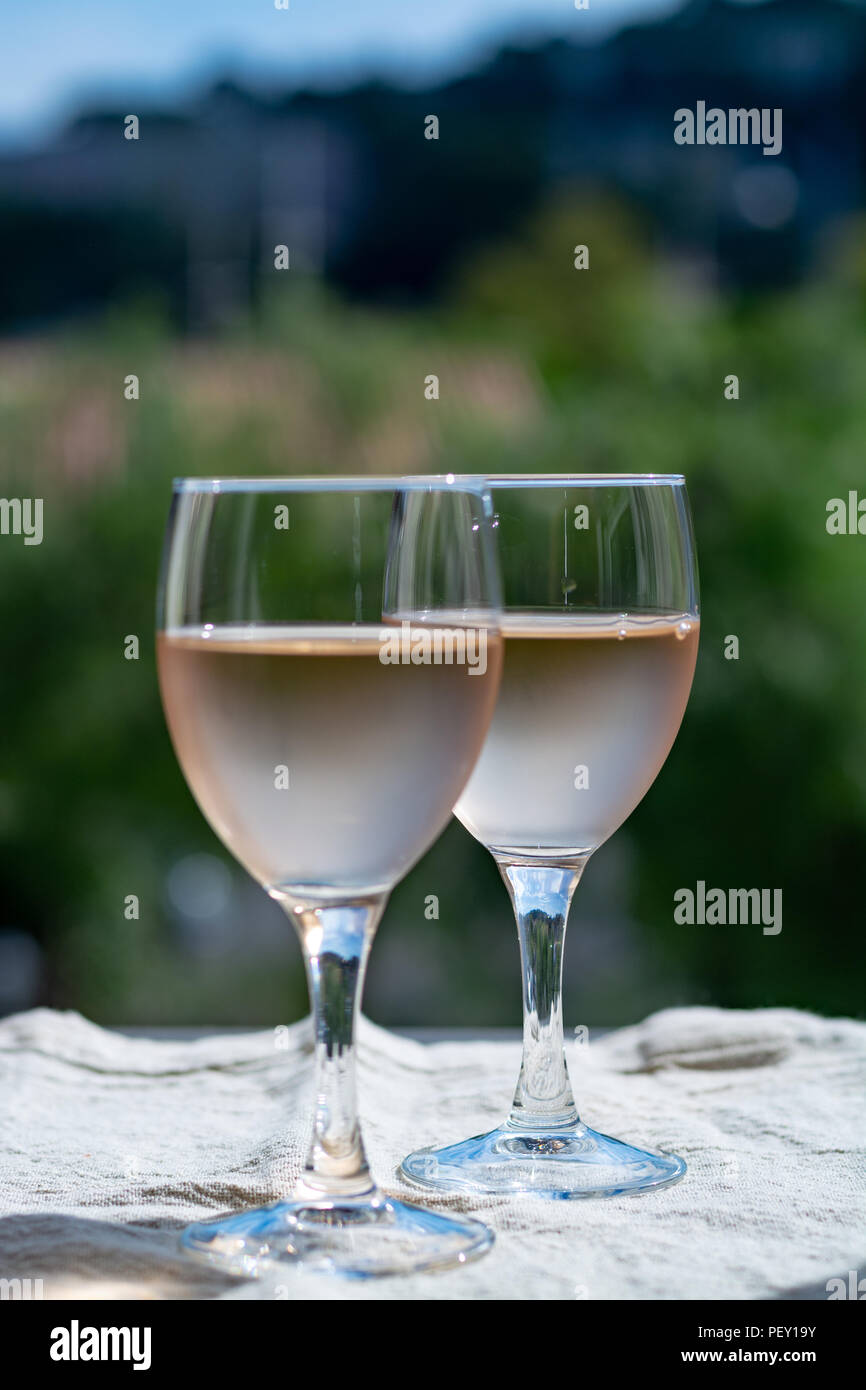 Rose wine of Provence, France, served cold on outdoor terrace in two ...
