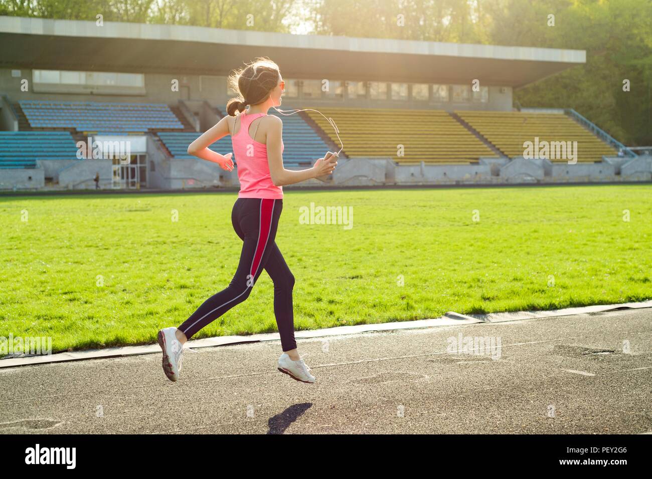 Teen girl running marathon hi-res stock photography and images - Alamy