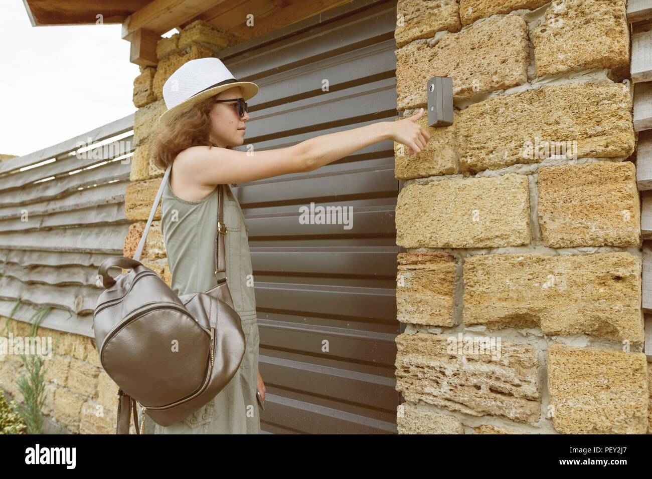 Woman young intercom system hi-res stock photography and images - Alamy