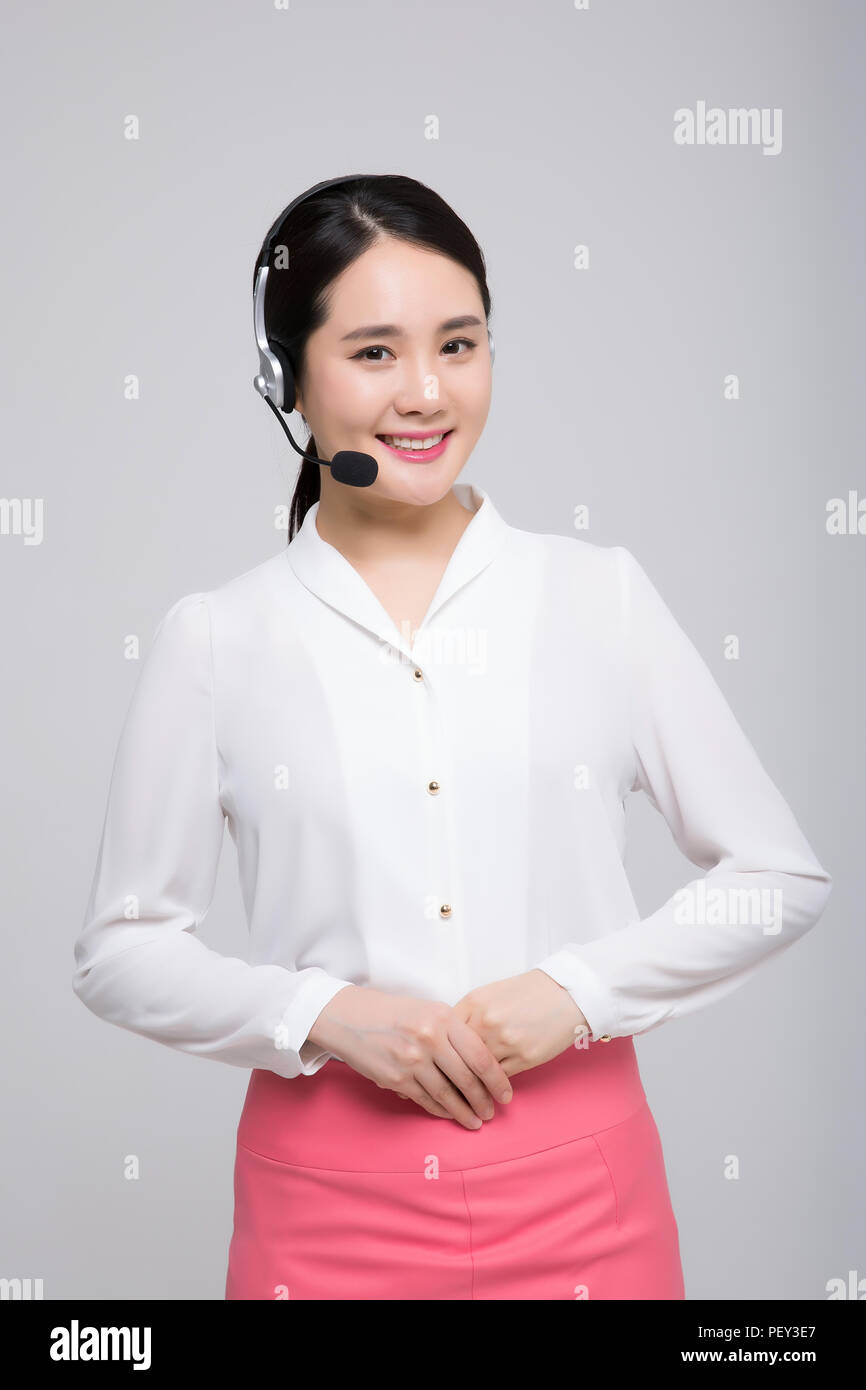 Customer support operators working in call center office, wearing headset isolated on white ...