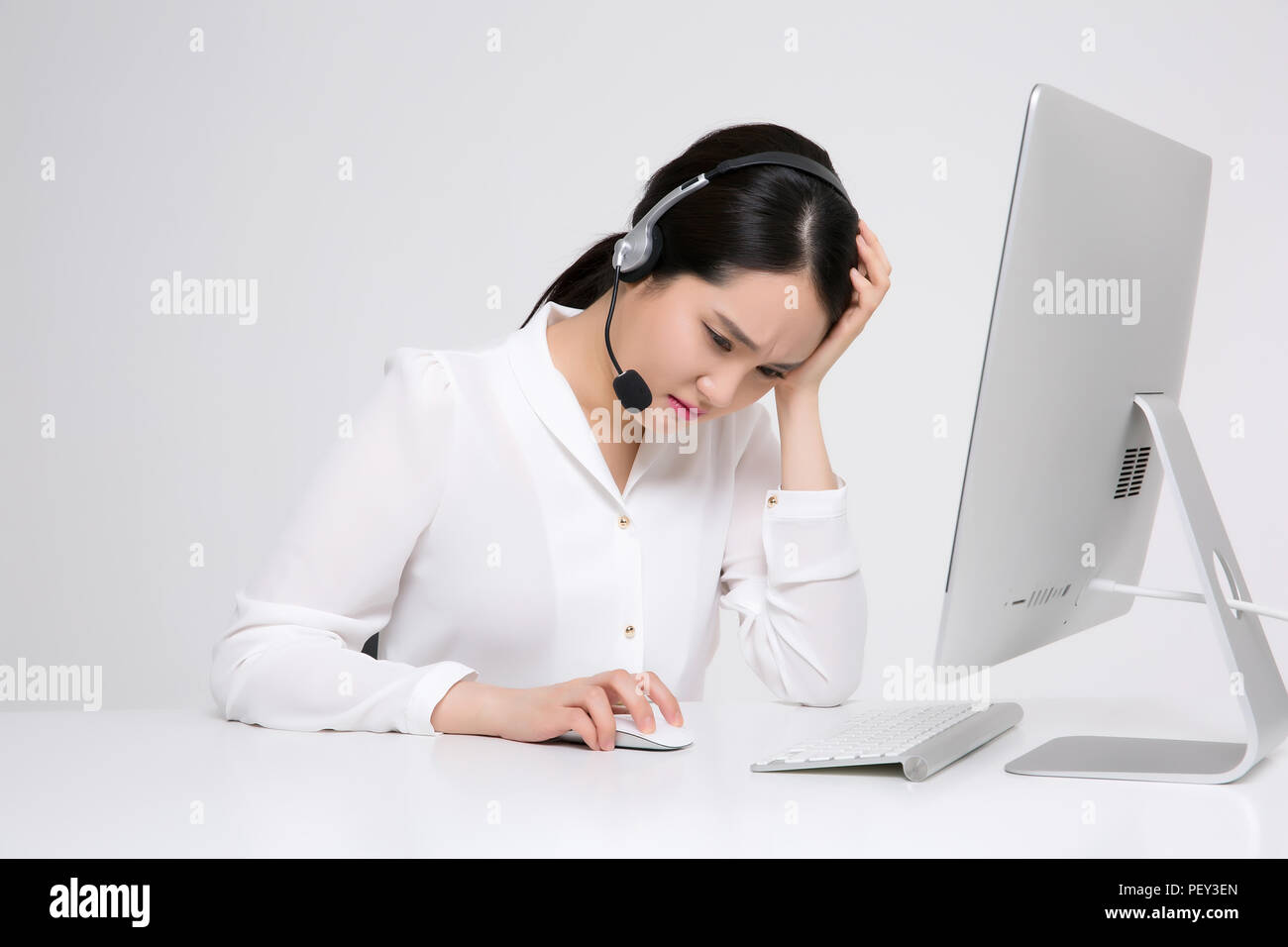 Customer support operators working in call center office, wearing ...