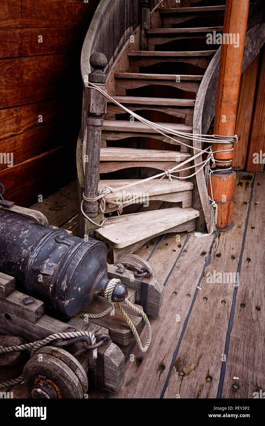 Reconstruction of pirates galleon, wooden deck with cannon ready to ...