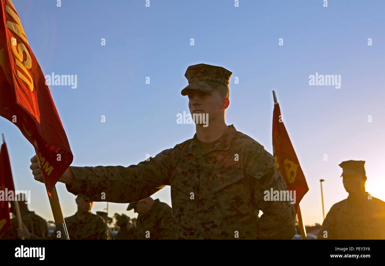 Cpl. Joseph L. White III holds his company guidon in preparations for ...