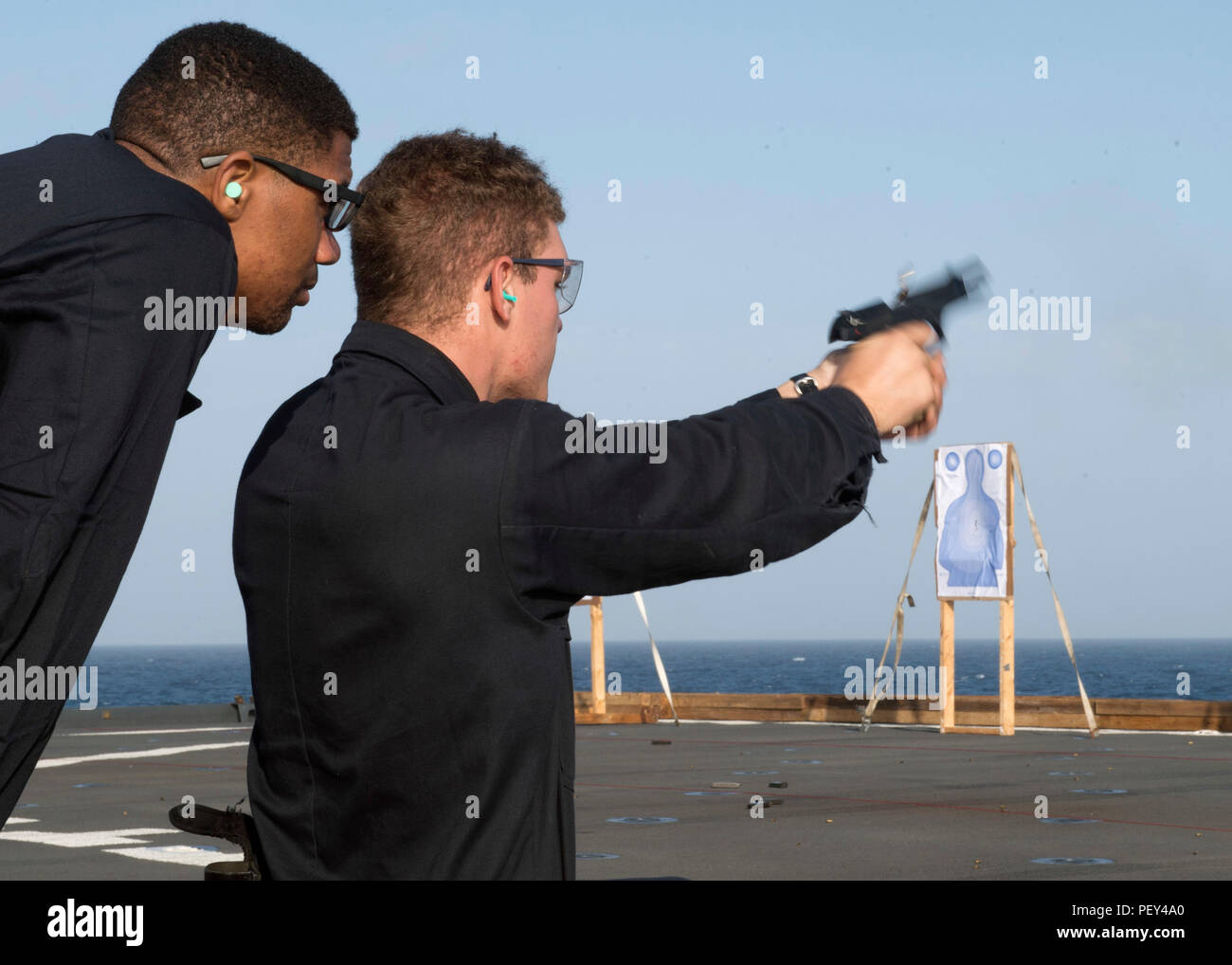 EASTERN COAST OKINAWA (Feb. 13, 2016) – Fire Controlman 1st Class Nikos ...