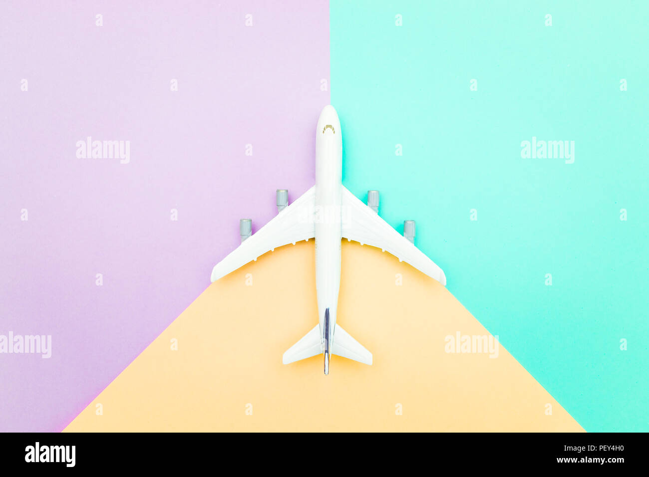 miniature plane on pastel colors background , travel and vacation ...