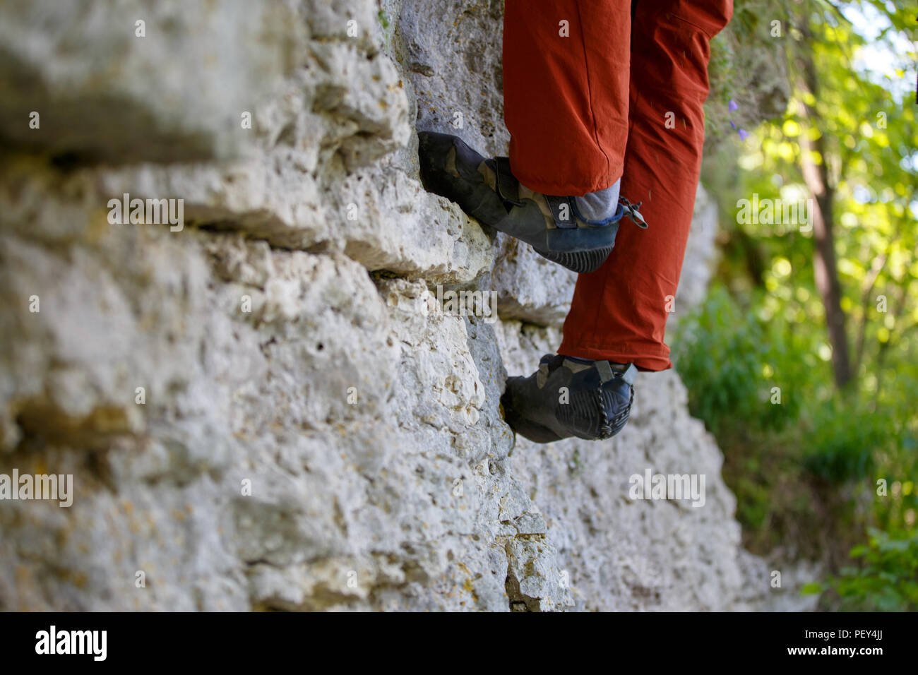 Man scrambling rocks hi-res stock photography and images - Alamy