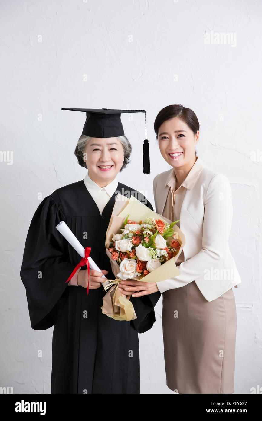 Graduation robe hi-res stock photography and images - Alamy