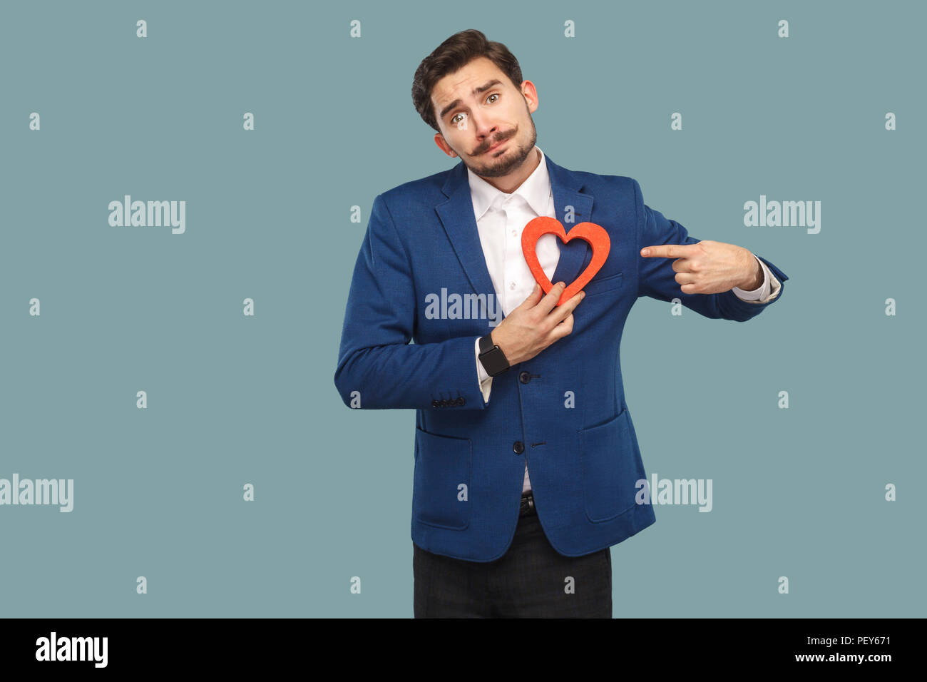 Sad unhappy broken heart man in blue jacket and white shirt, standing ...